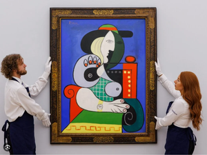 Picasso’s painting “Woman with a Clock” went under the hammer for $139. ...